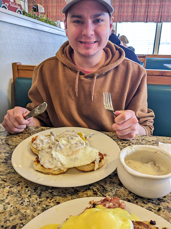 Biscuits and gravy: where clouds meet savory heaven. This plate could make even the grumpiest morning person smile.