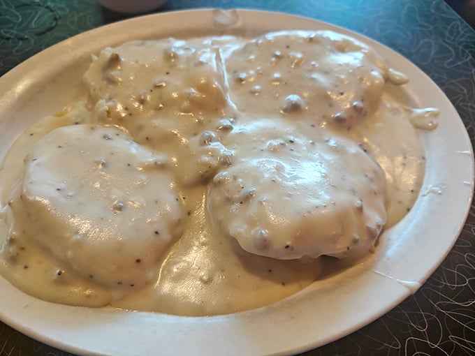 Gravy so good, you'll want to swim in it! These biscuits are like fluffy clouds floating in a savory sea. Dieters beware: resistance is futile.