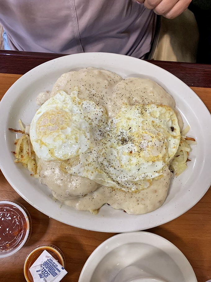 Gravy train coming through! This plate of biscuits and gravy is so generous, it might need its own zip code.
