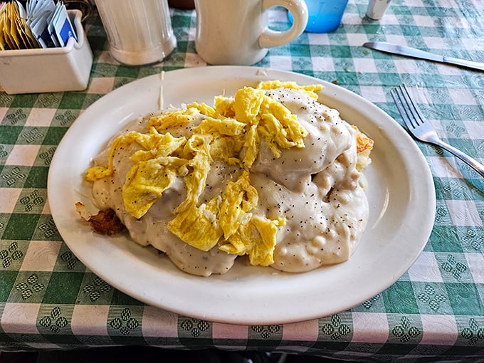 Eggs and gravy: the dynamic duo of breakfast. This plate is so loaded, it could bench press your hunger away!