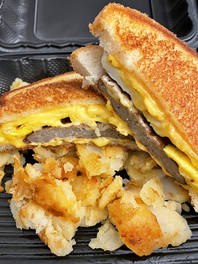 The breakfast sandwich that puts your sad desk lunch to shame. Layers of gooey cheese and savory sausage nestled between golden, crispy bread &ndash; a morning game-changer!