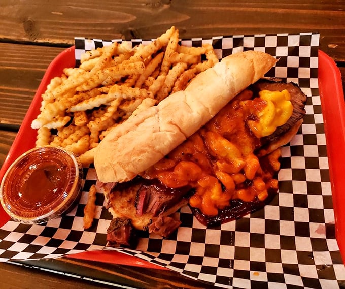 This isn't just a sandwich; it's a brisket love letter with a side of crinkle-cut fries that makes you wonder why you'd ever waste stomach space on salad.