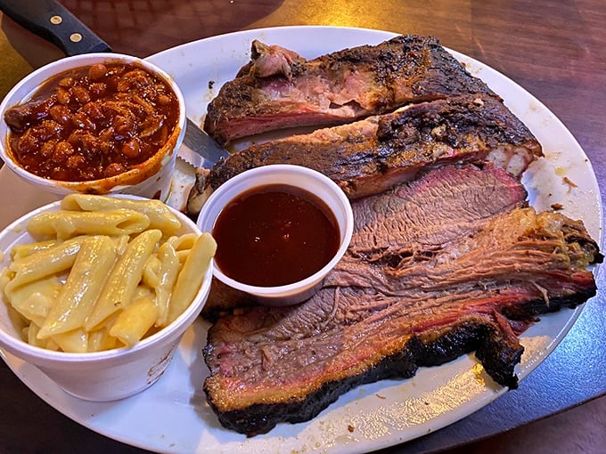 Brisket and ribs, oh my! This plate is a testament to the magic that happens when meat meets smoke and time.