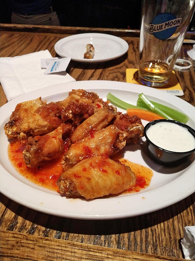 Blue Moon and buffalo wings: a pairing so perfect, it could make a sommelier weep. Who needs wine when you've got this dynamic duo?