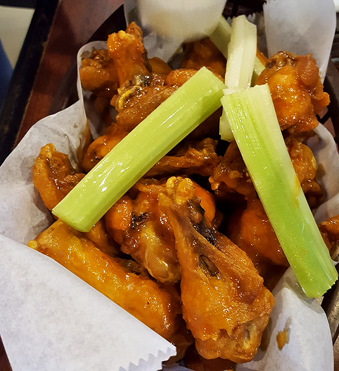 Caution: Hot stuff coming through! These saucy wings are hotter than a summer sidewalk and twice as satisfying. Napkins are not optional.