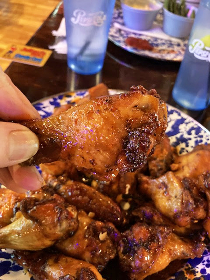 Up close and personal with flavor! These wings are so tantalizing, you can almost taste the smoky-sweet goodness through the screen. Napkins? Who needs 'em?