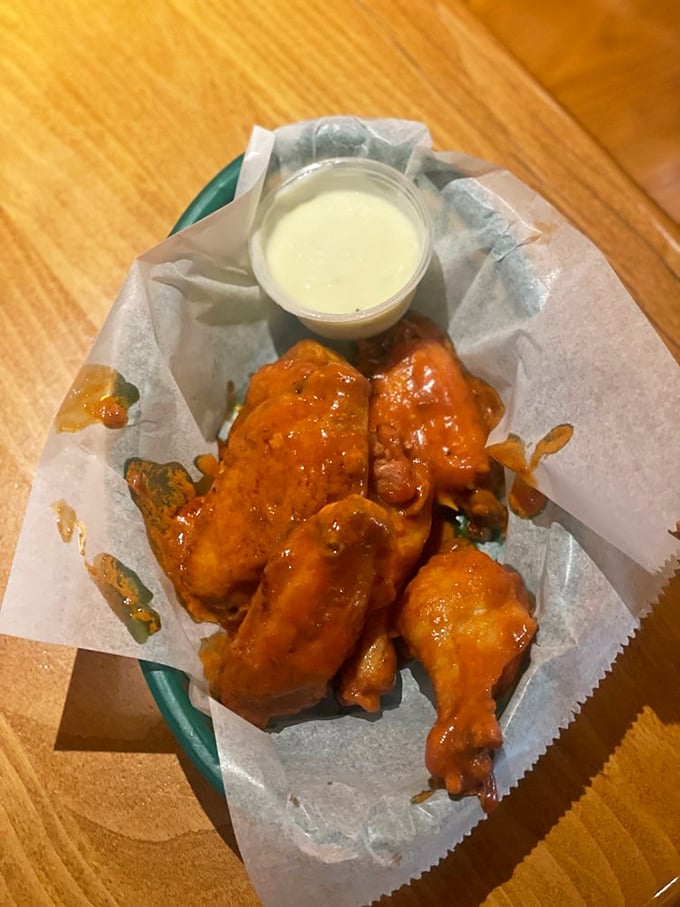 These wings aren't just finger-lickin' good, they're whole-hand-lickin' fantastic. The dip? That's your ticket to flavor town.