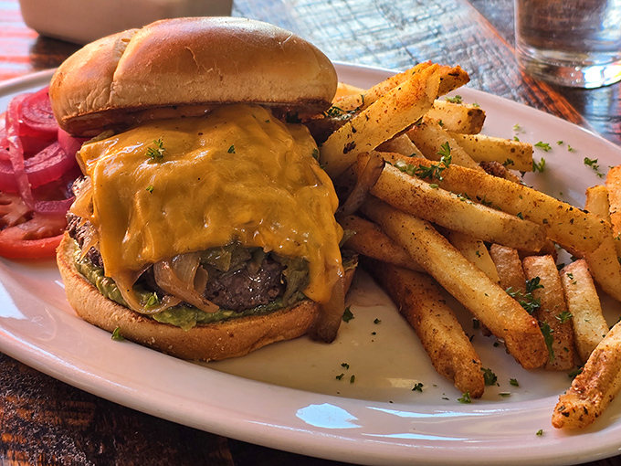 Cheese waterfall alert! This burger's so juicy, you might need a snorkel. Dive in and savor every bite.