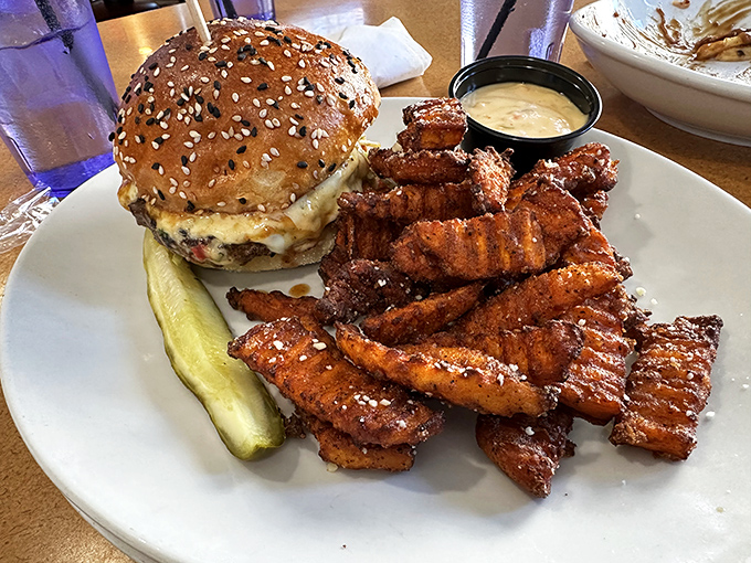 Crinkle-cut fries and a burger that means business &ndash; it's like a hug for your taste buds. Comfort food level: expert.