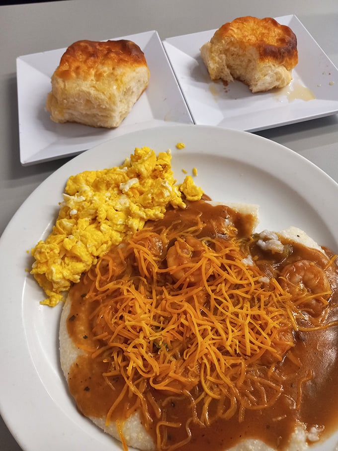 Cheesy grits and scrambled eggs: The breakfast combo that'll make you want to hug the chef. It's comfort in a bowl, y'all.