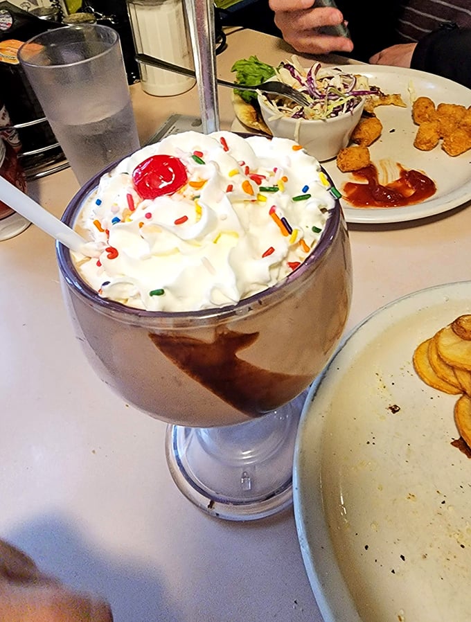 Chocolate lovers, rejoice! This shake isn't just thick, it's got more body than a soap opera plot. Topped with whipped cream and sprinkles, it's pure indulgence.