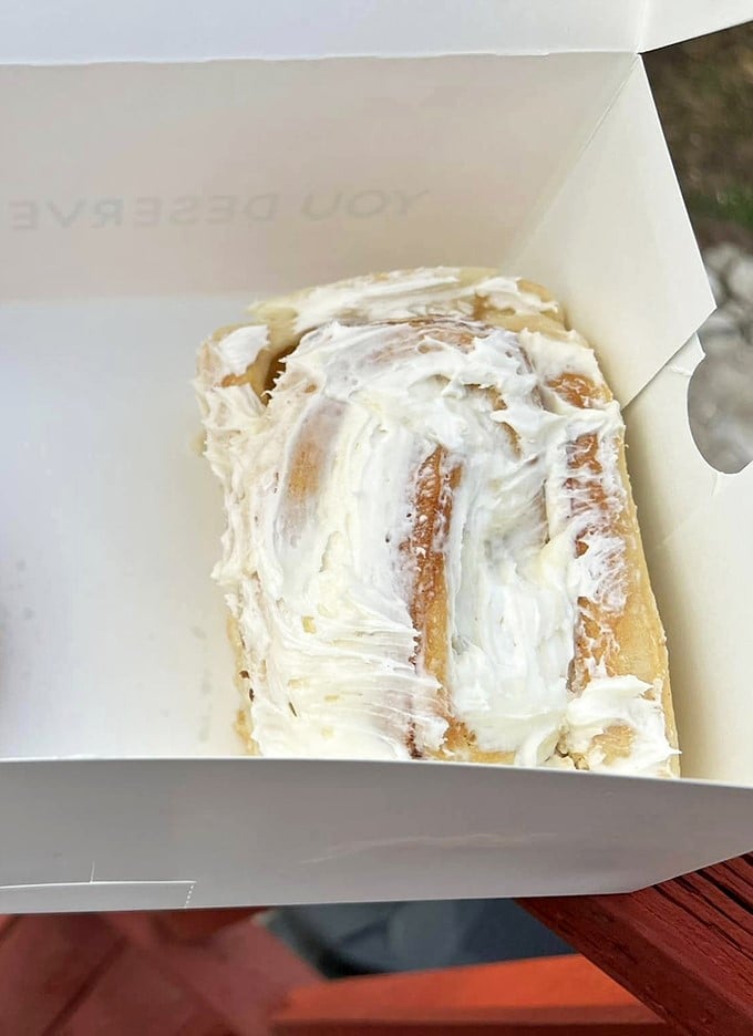 Holy frosting, Batman! This cinnamon roll isn't just dessert, it's a cloud of sugary bliss that'll make you forget about your diet.