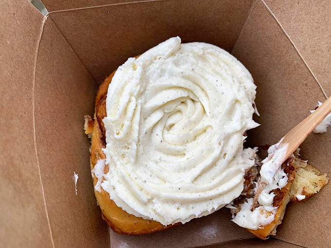 Behold, the crown jewel of breakfast! This cinnamon roll, with its cloud-like frosting, is what sweet dreams are made of.