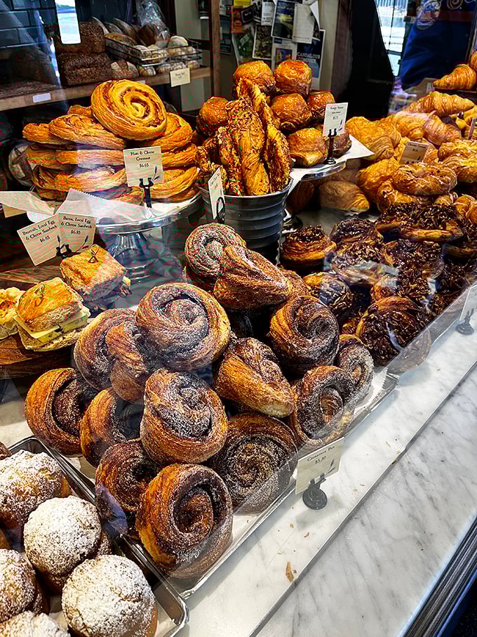 Cinnamon roll heaven: where layers of dough and spice create a tower of deliciousness that would make the Leaning Tower of Pisa jealous.