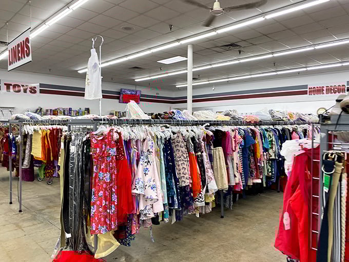 A rainbow explosion of fabric awaits! It's like walking into your eccentric aunt's closet, if your aunt was the size of a department store.