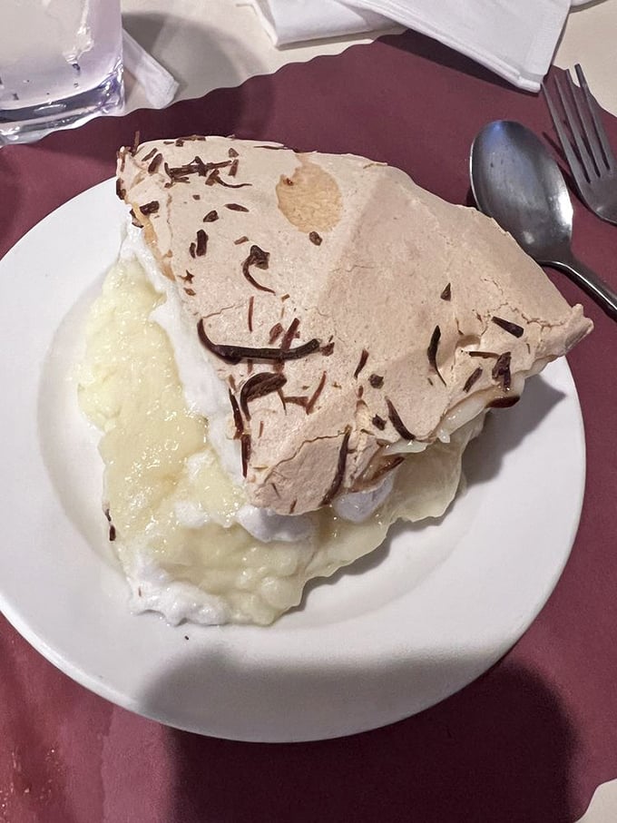 Cloud nine, meet plate! This coconut cream pie looks fluffier than a 1950s prom dress and twice as dreamy.