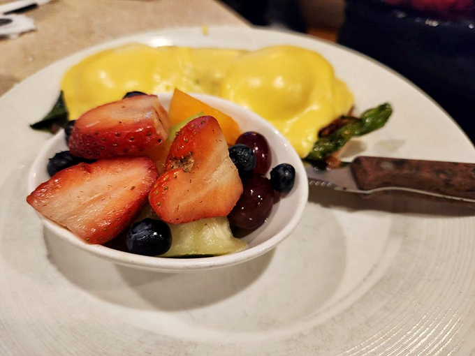 Holy hollandaise, Batman! This Cosmic Benedict is out of this world, with perfectly poached eggs and a generous drizzle of sunshine-yellow sauce.