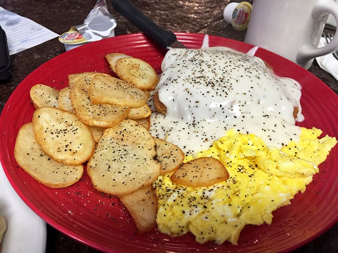 Country fried steak: where comfort food meets cardiac event. This plate is more loaded than a politician's promises, but twice as satisfying.