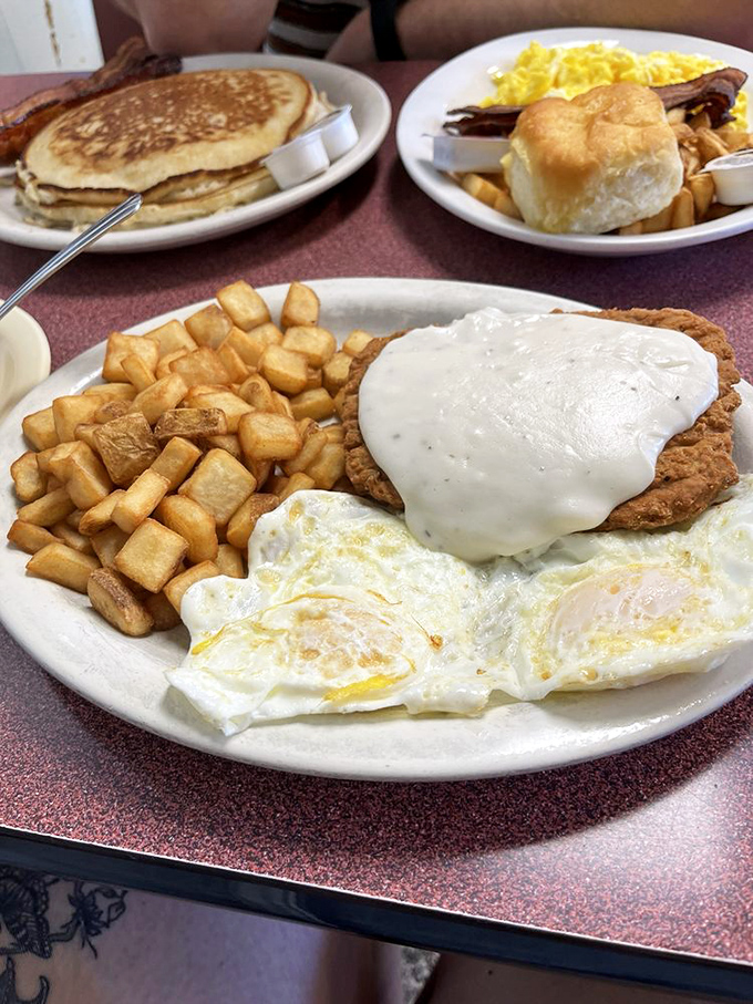 A feast fit for a country music star! Golden-brown chicken, crispy bacon, and eggs sunny enough to rival a Tennessee morning.