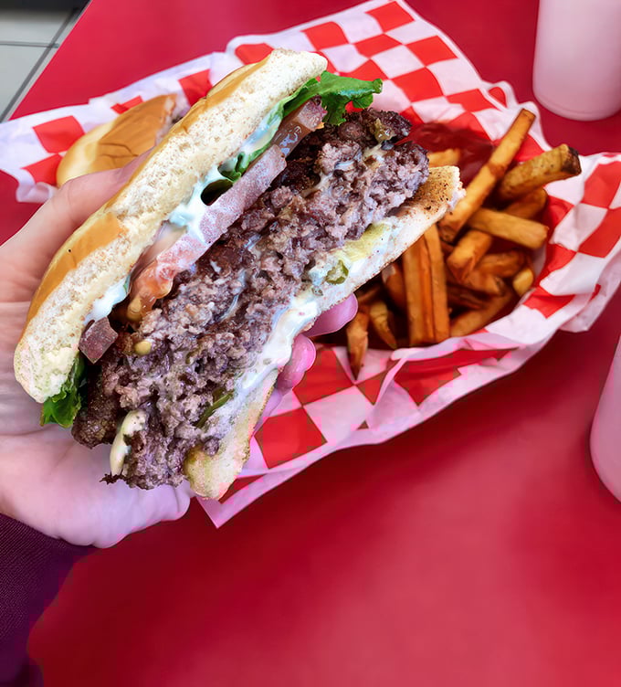 Double the patty, double the fun! This burger is stacked higher than my to-read pile, but unlike those books, it won't be around for long.