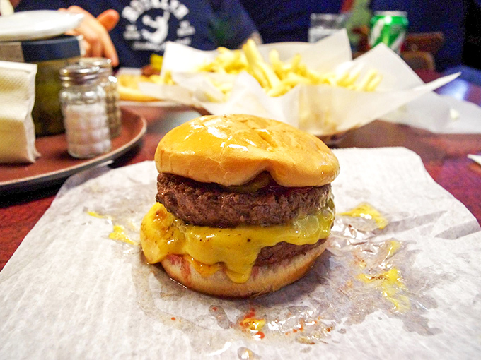 Double the patty, double the joy! This burger doesn't just satisfy hunger &ndash; it obliterates it with a one-two punch of beefy perfection.