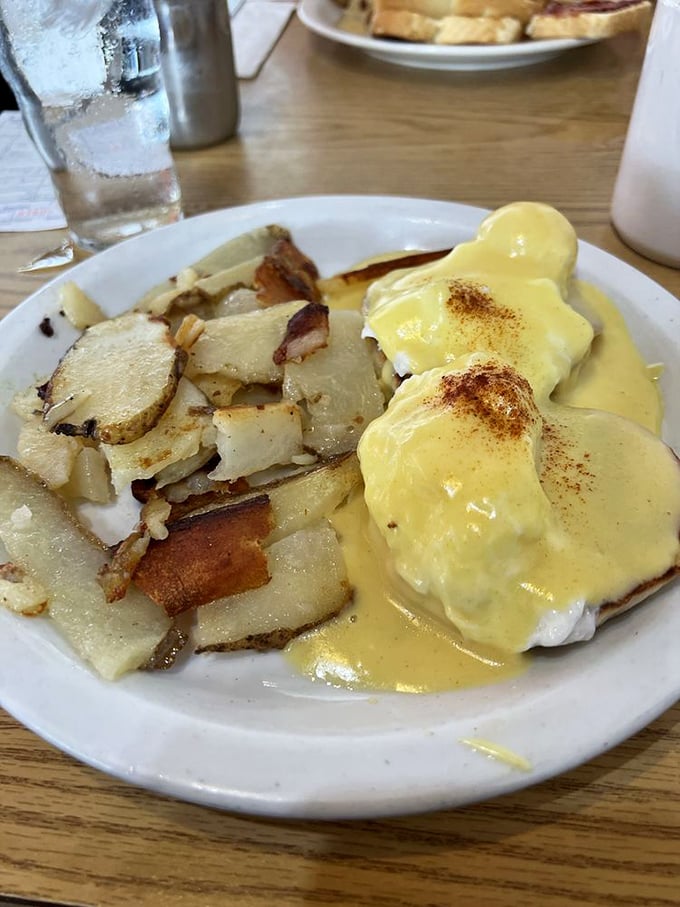 Benedict, you've outdone yourself! This Eggs Benedict combo is a symphony of flavors that would make even the pickiest eater swoon.