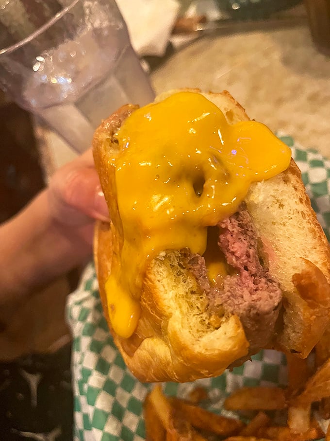 Caution: Cheese lava ahead! The Nook's famous Juicy Lucy isn't just a meal, it's an experience that demands a napkin&hellip; or ten.