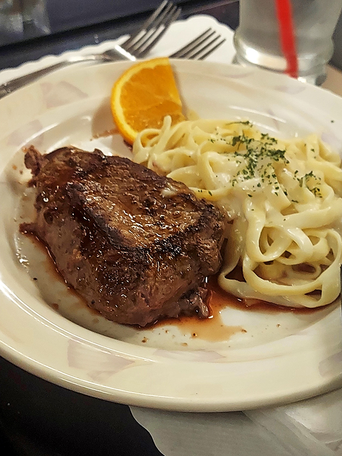 This fillet mignon isn't just a steak, it's a work of art. Perfectly seared and served with pasta that's clearly been practicing its twirls.