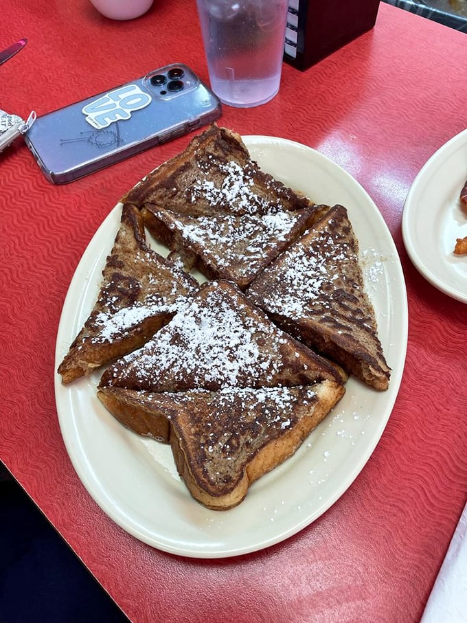 French toast that's been powdered, quartered, and somehow transformed into something your grandma would approve of but could never quite replicate.