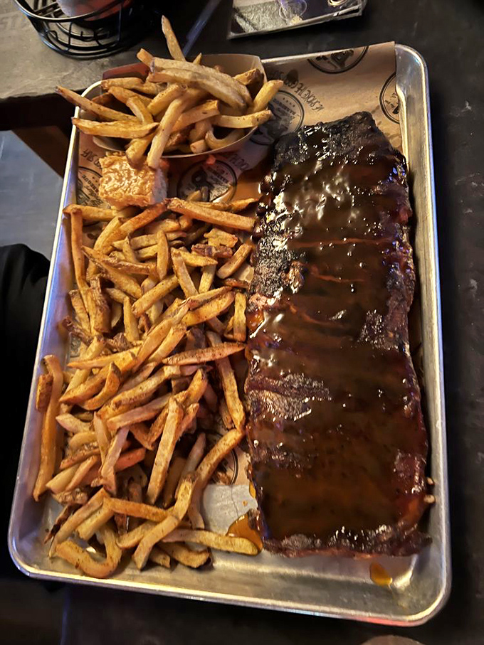 The full monty of meat! This rack of ribs is longer than a CVS receipt and twice as satisfying.