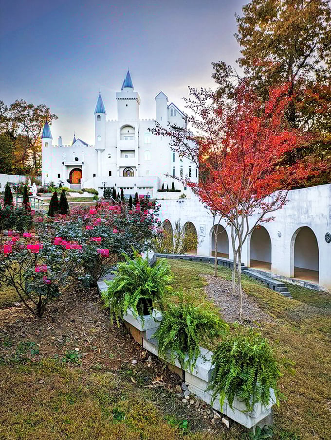 Who needs a moat when you've got a garden this gorgeous? Roses and cypress trees create a regal approach fit for any aspiring monarch.
