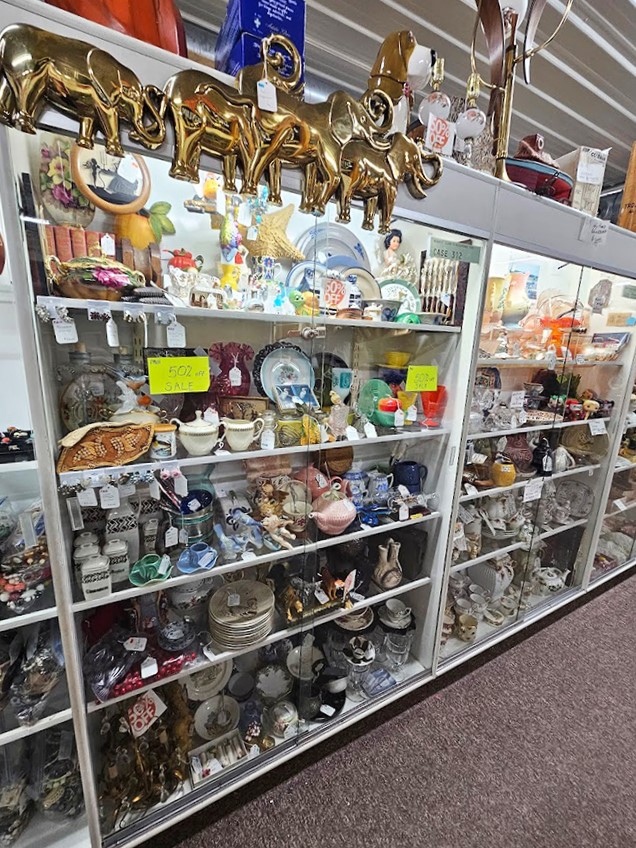 Shiny, sparkly, and oh-so-delicate! This glassware display is like a disco ball exploded in your great-aunt's china cabinet.