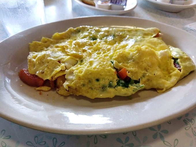 Green eggs and ham? Dr. Seuss would approve of this colorful omelet bursting with fresh veggies and cheesy goodness.
