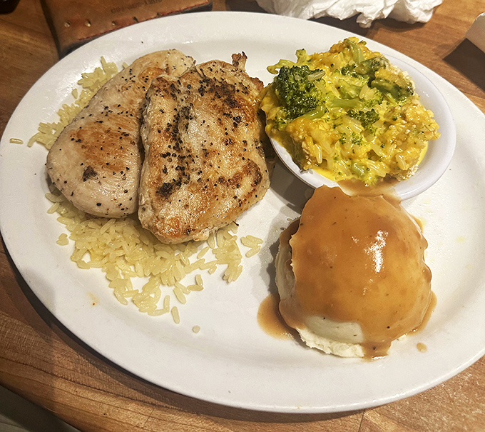 Perfectly grilled fish atop rice with a side of broccoli casserole and those famous mashed potatoes&mdash;proof that healthy-ish can still be delicious.