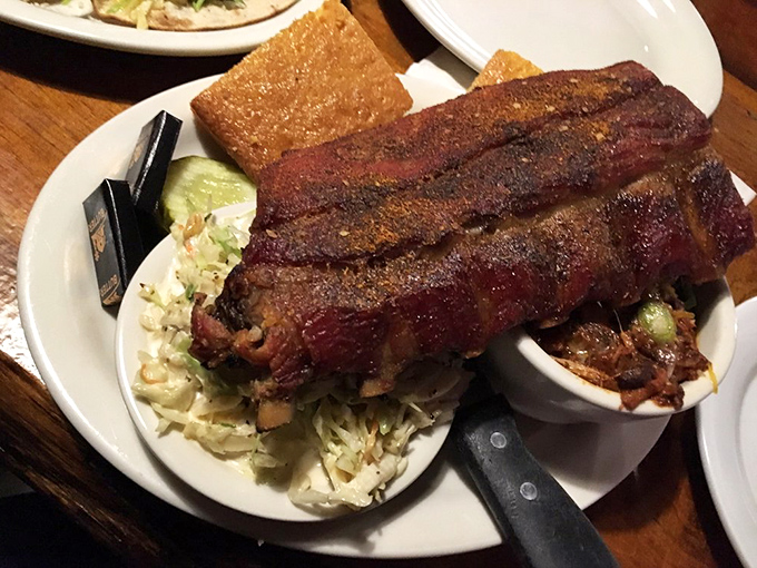 Behold, the holy grail of BBQ! These baby backs are so tender, they're practically falling off the bone in anticipation.