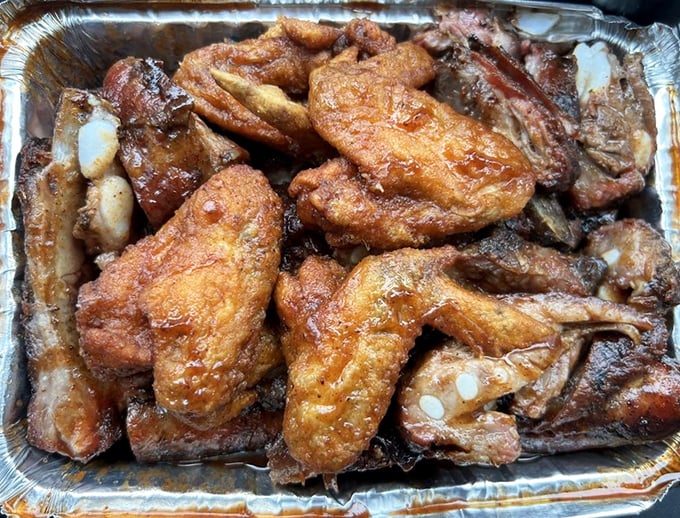 The JBL Special: Where chicken wings and ribs join forces like the Avengers of barbecue. Resistance is futile, my friends.