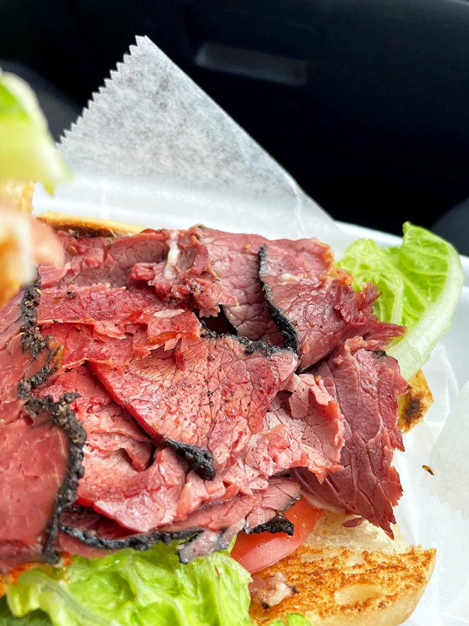 Meat poetry in motion! This pastrami masterpiece features slices so tender they practically surrender at first bite. The lettuce is just there for moral support.