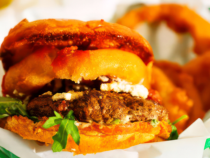 Behold, the Juicy Lucy! This burger's molten cheese core is hotter than a Montana summer. Bite with caution, but savor with abandon.