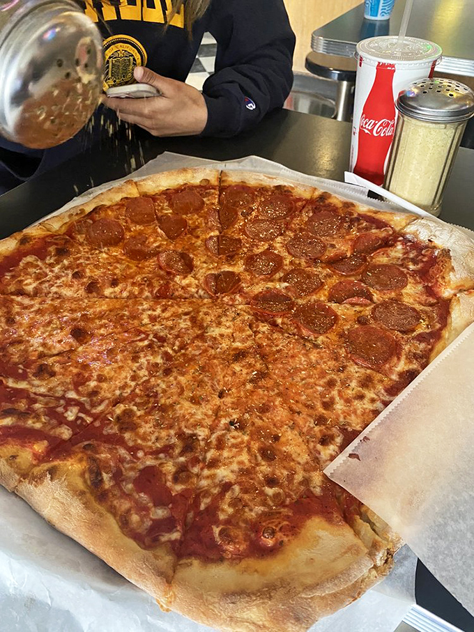 The age-old dilemma: cheese or pepperoni? At Arinell, you can have your cake (err, pizza) and eat it too!