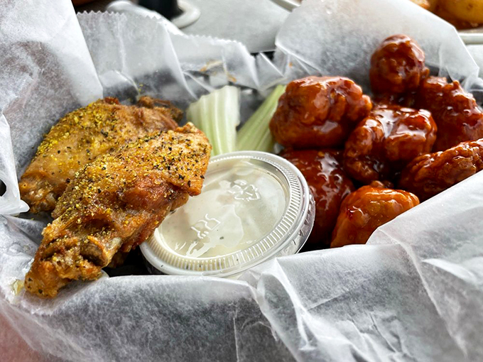 Lemon pepper wings and fries: a dynamic duo that's zestier than a sitcom couple's witty banter.