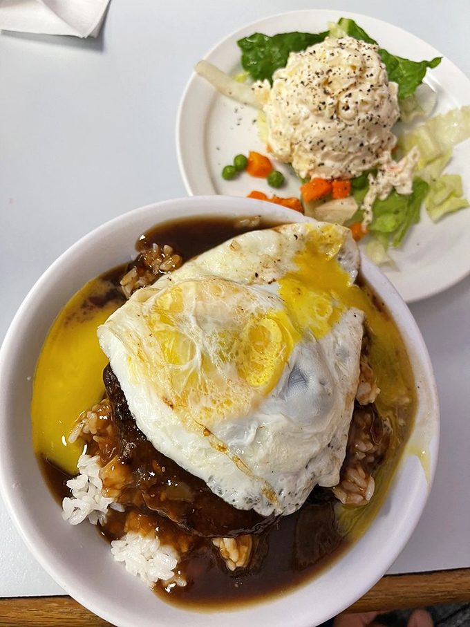 The legendary Loco Moco&mdash;where a sunny-side-up egg crowns a hamburger patty like a royal hat at Ascot, all swimming in gravy that demands to be sopped up.