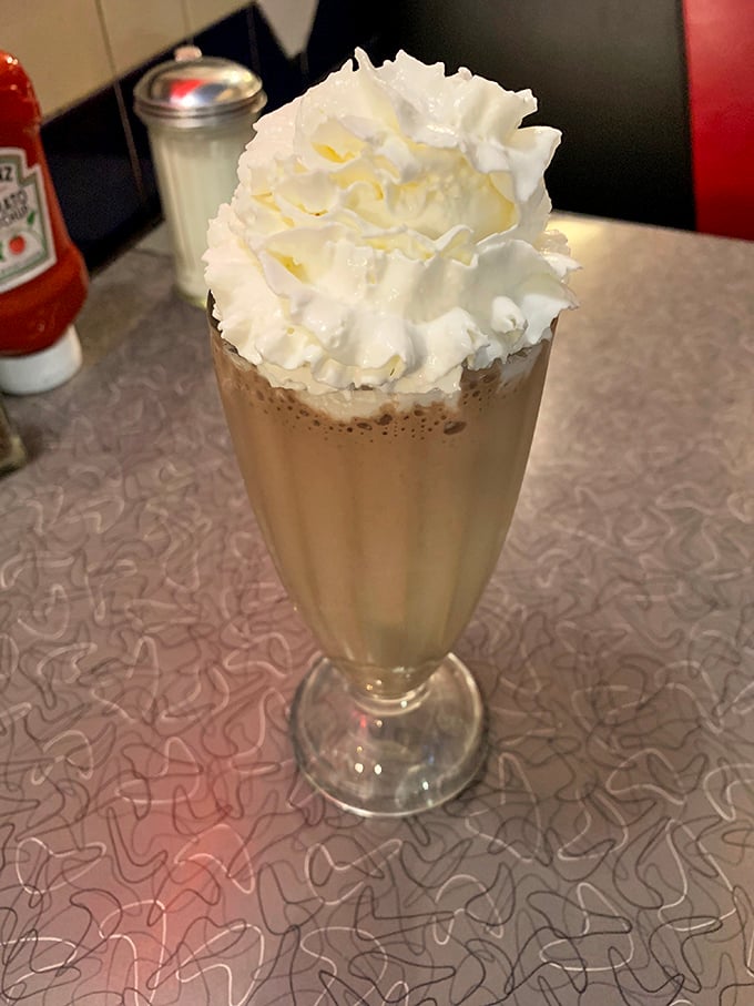 Whipped cream mountain ahead! This milkshake comes with its own snow-capped peak. Grab a spoon and start your delicious ascent.