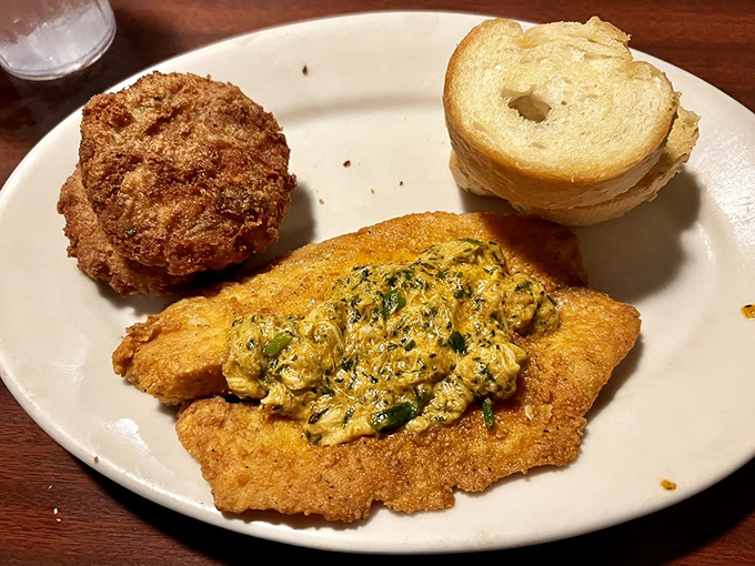 The South rises again... on your plate! This Louisiana Fried Tilapia platter is a crispy, flaky ode to Cajun cuisine.