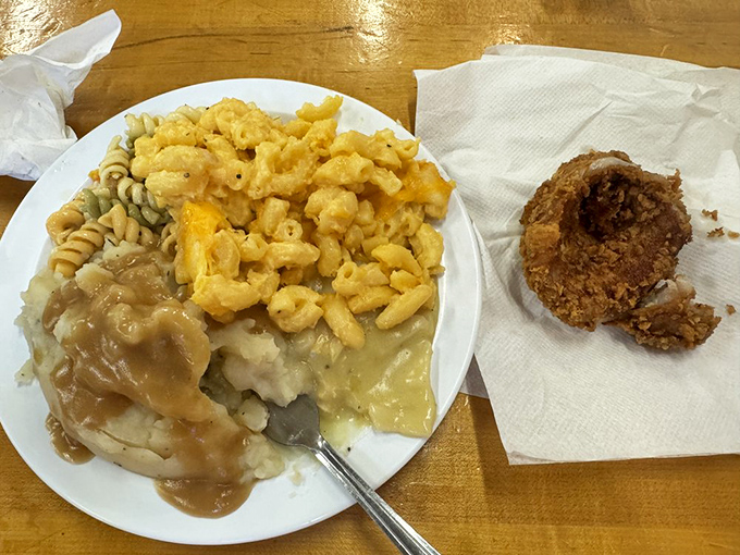 When your plate looks like a Southern family reunion &ndash; mashed potatoes with gravy embracing mac and cheese while fried chicken watches approvingly.