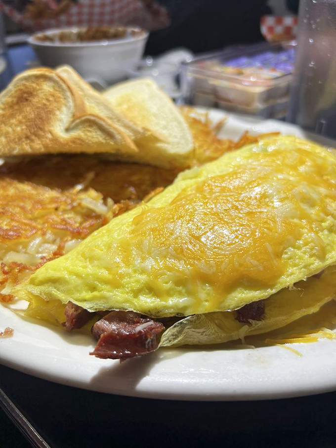 This omelet is so stuffed, it's practically the Thanksgiving turkey of breakfast. Cheese for days and zero regrets!