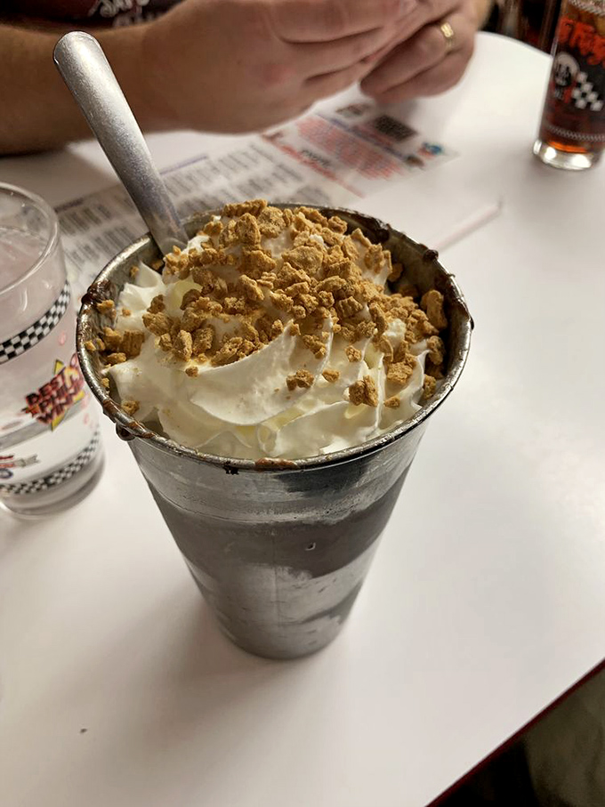 Behold, the Everest of milkshakes! This towering treat is so thick, you might need a sherpa to help you finish it.