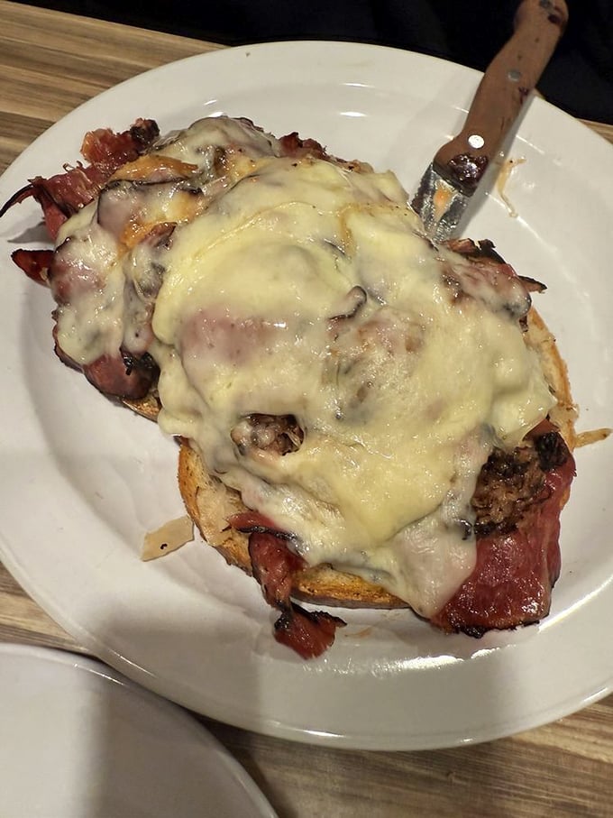The open-faced Reuben: for when you want to see all the delicious layers before they disappear. It's like a meaty, cheesy work of art on a plate.