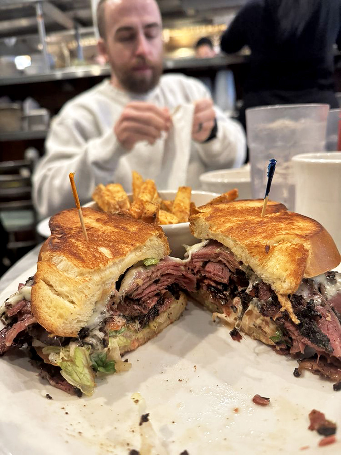 When pastrami and bread achieve perfect harmony, angels sing. This sandwich's cross-section reveals layers of flavor that would make a geologist weep.