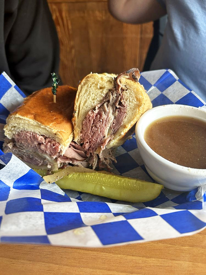 Pastrami perfection! This sandwich is so packed, it could moonlight as a weightlifting champion at the deli Olympics.