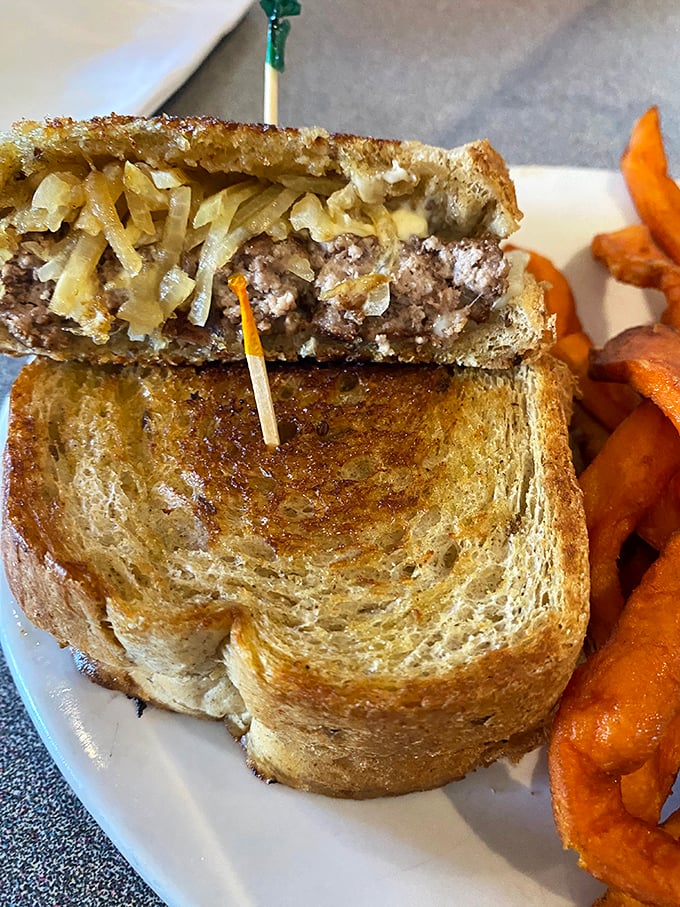 The patty melt: where burger meets grilled cheese in a union so perfect, it could bring world peace. Or at least lunchtime bliss.